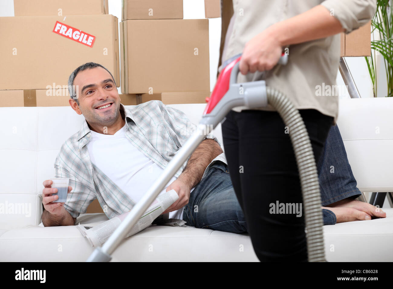 couple arranging their new apartment Stock Photo - Alamy