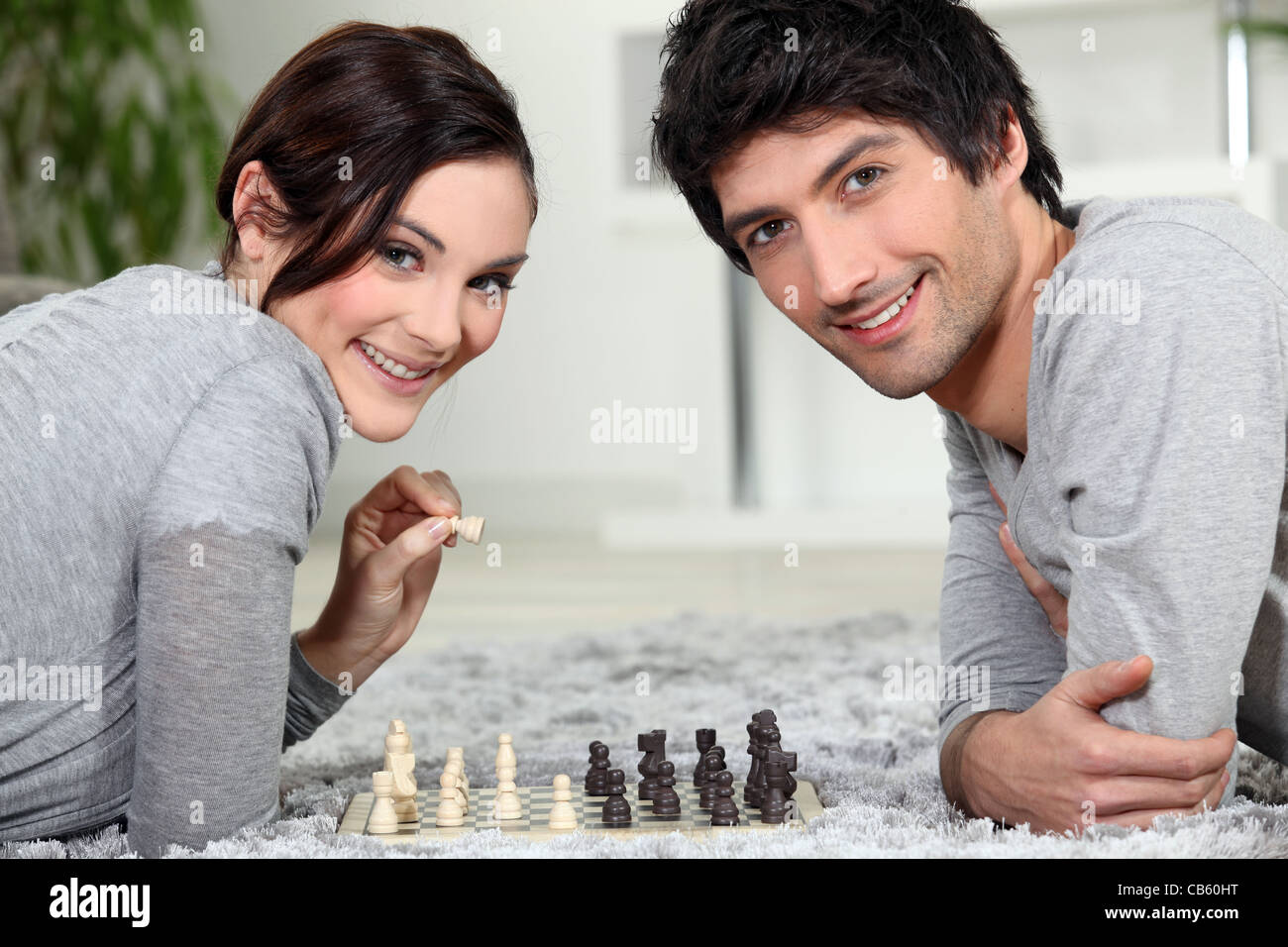 A couple playing chess Stock Photo - Alamy