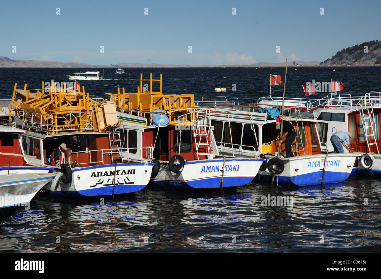 Amantani Island tourist boats in Puno harbour Stock Photo - Alamy
