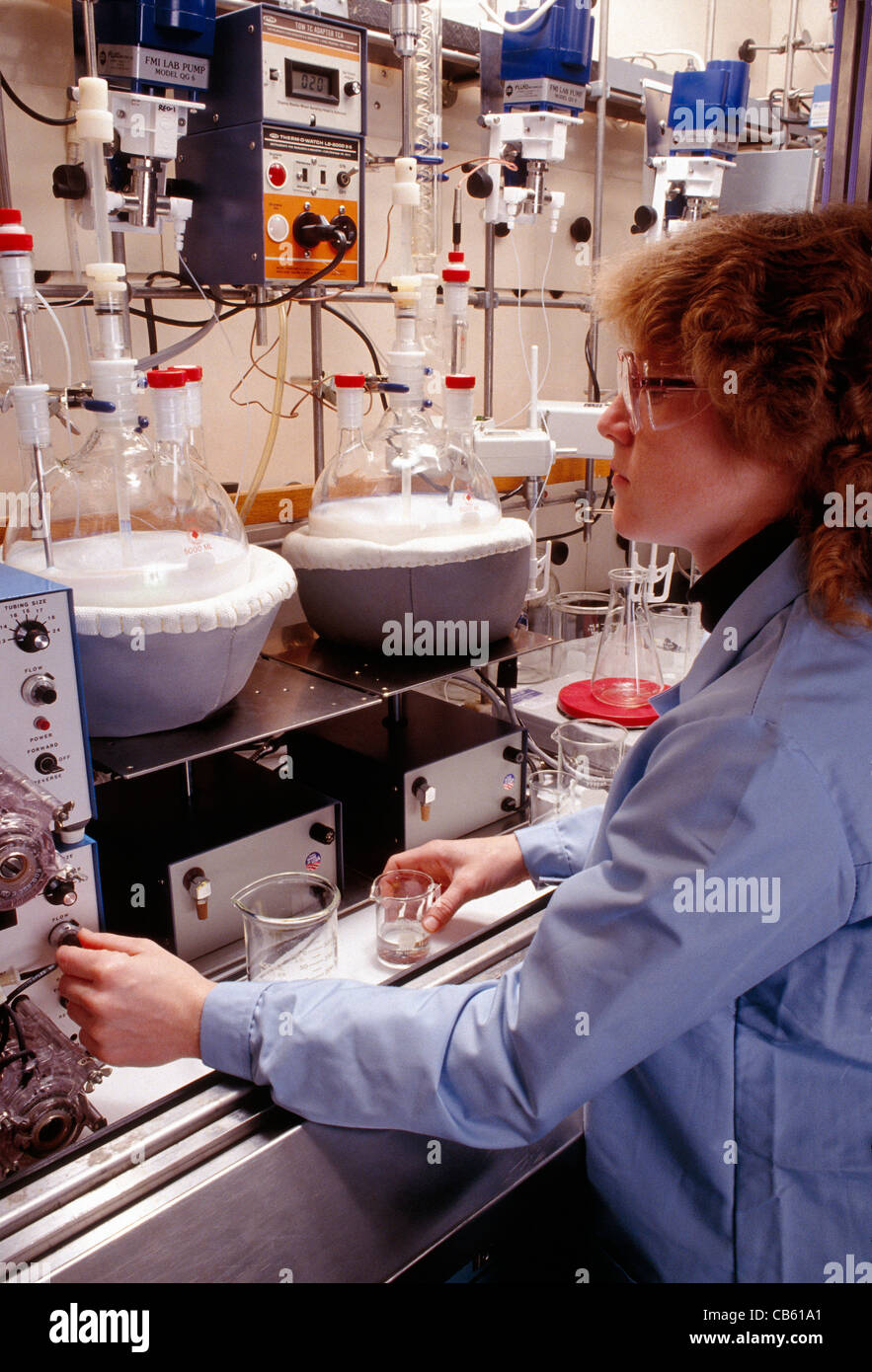 FEMALE SCIENTIST WORKING IN A RESEARCH & DEVELOPMENT LABORATORY AT A ...