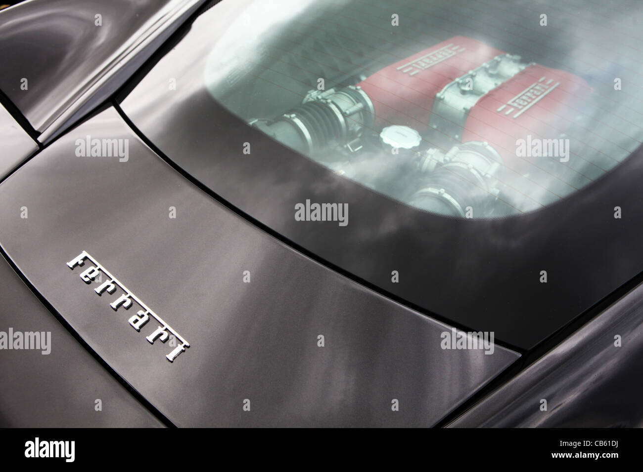 View through engine cover of a shiny Black Ferrari Stock Photo - Alamy