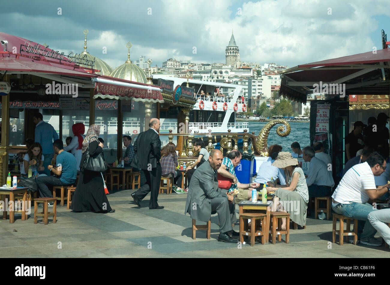 Istanbul's busy Eminonu square, looking towards Galata and its tower ...