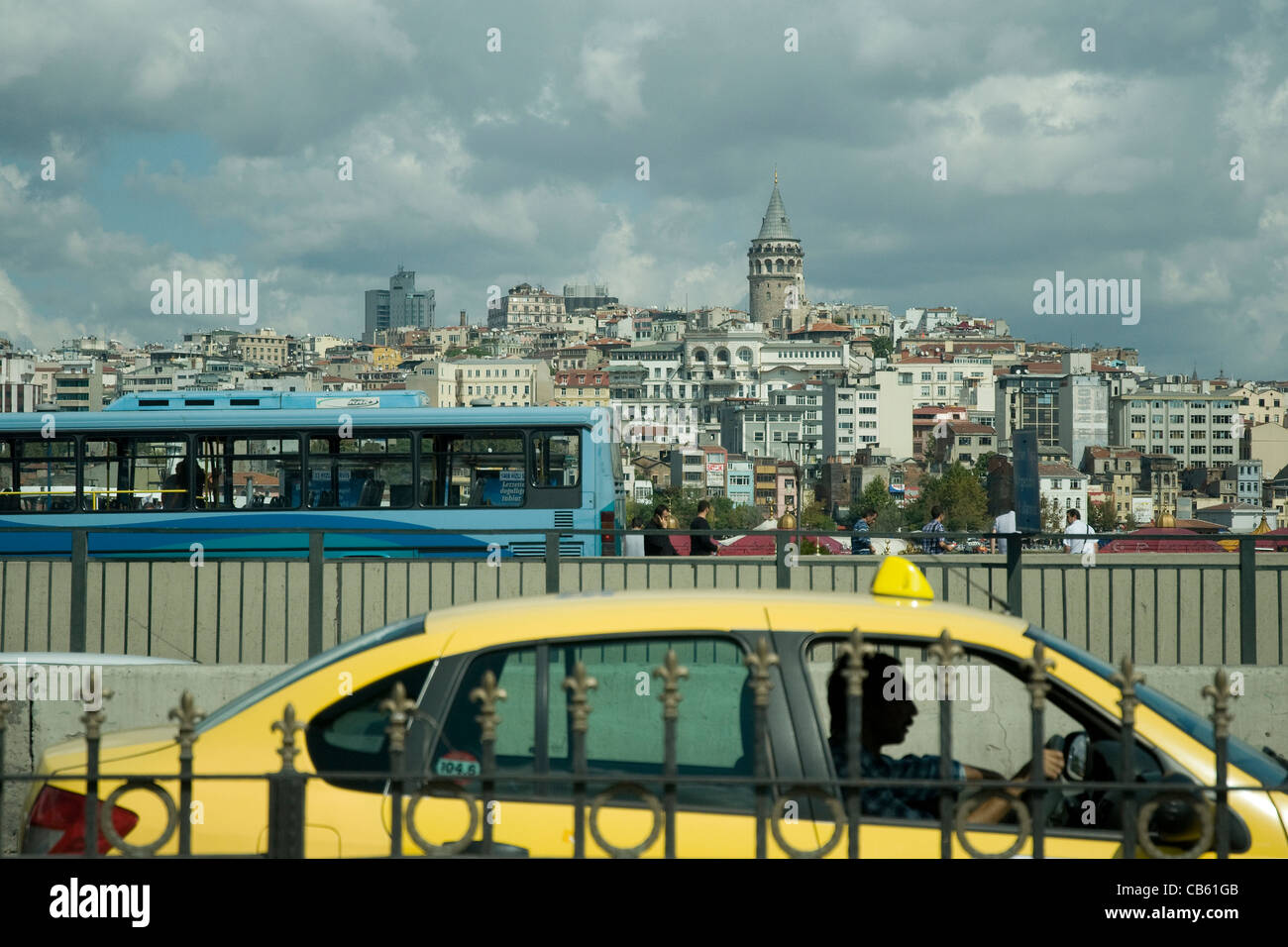 Looking from Istanbul's Eminonu square towards the Galata tower past a ...