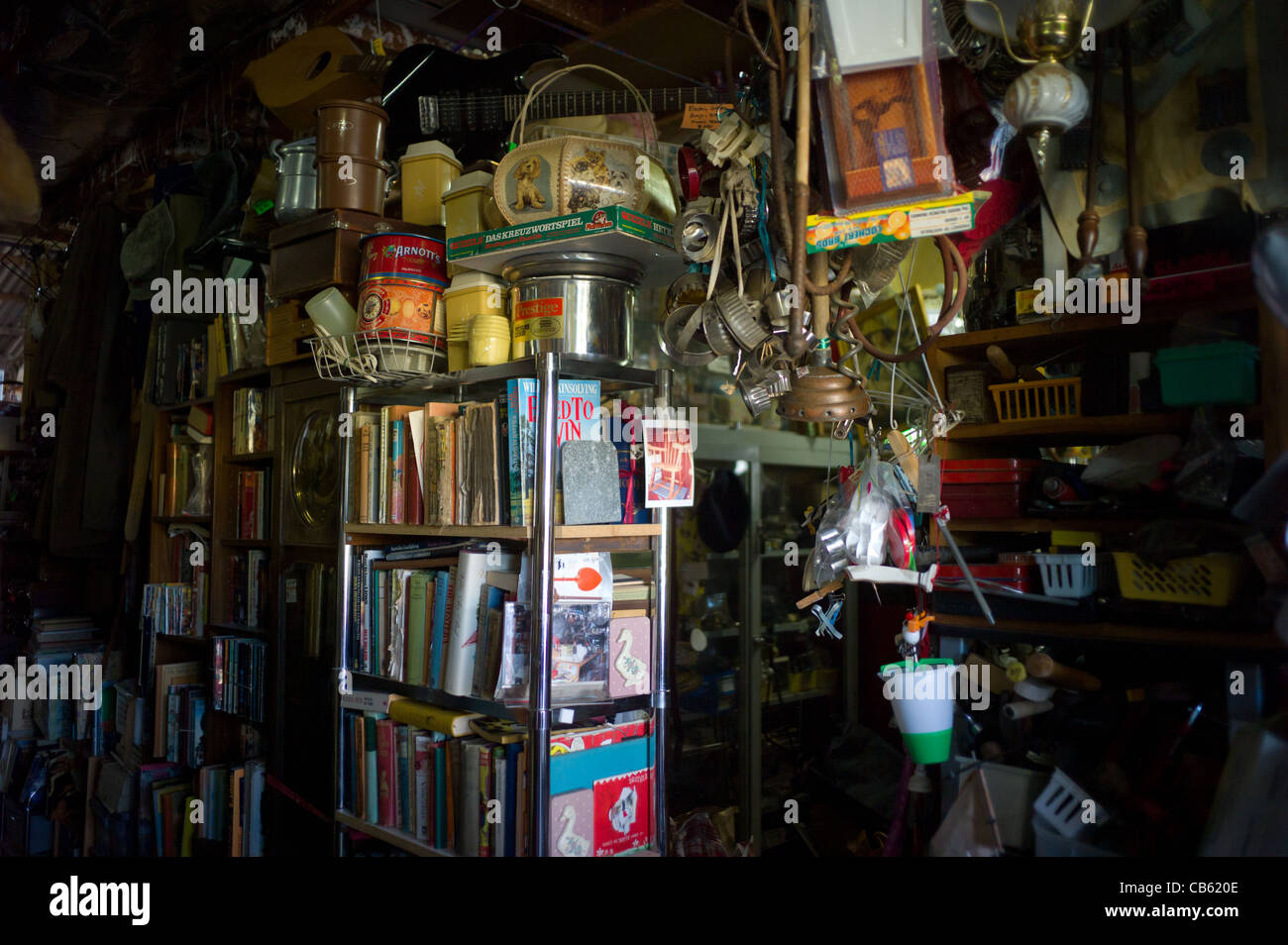 messy disorganised array of vintage items second hand fleamarket opp ...
