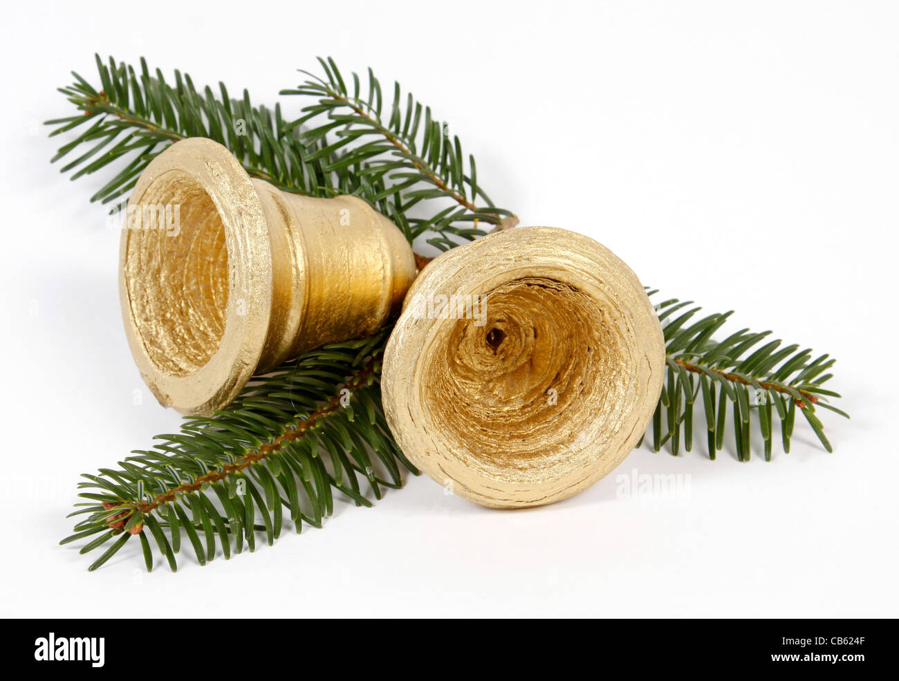 Two golden bells on the white background Stock Photo - Alamy