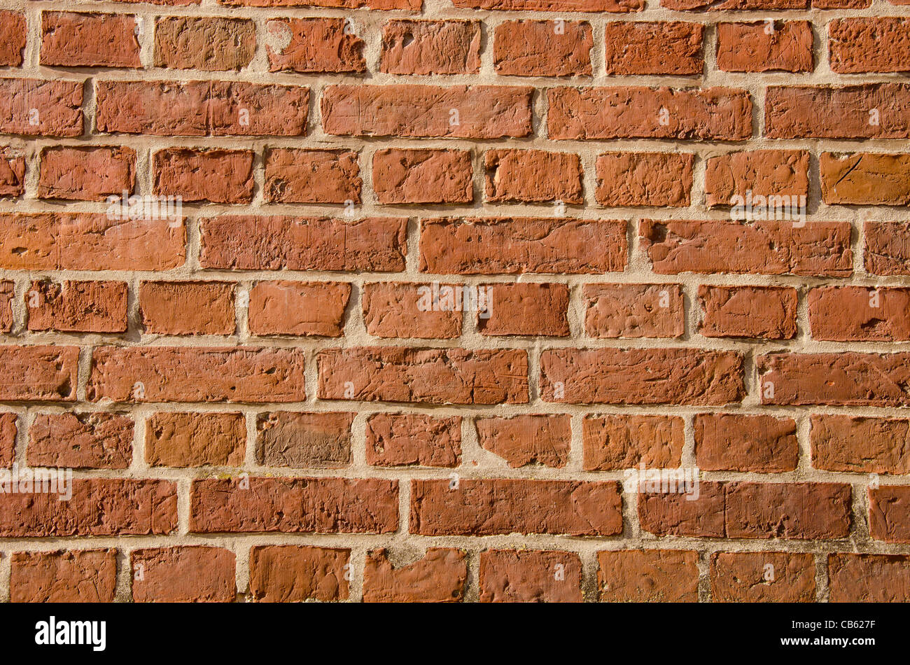 Wall built of red clay brick fragment. Architectural backdrop Stock ...