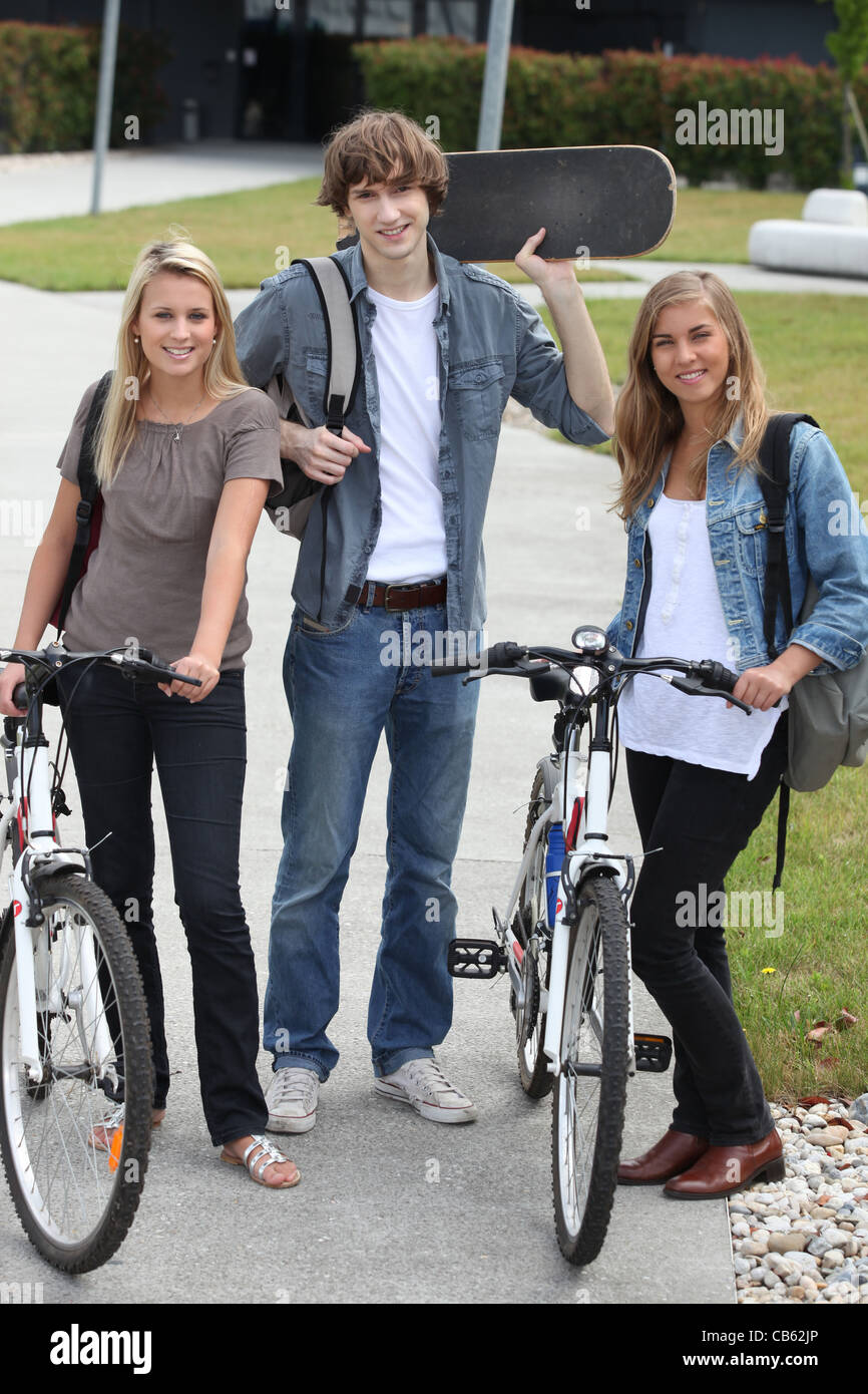 students with bikes and skateboard Stock Photo - Alamy
