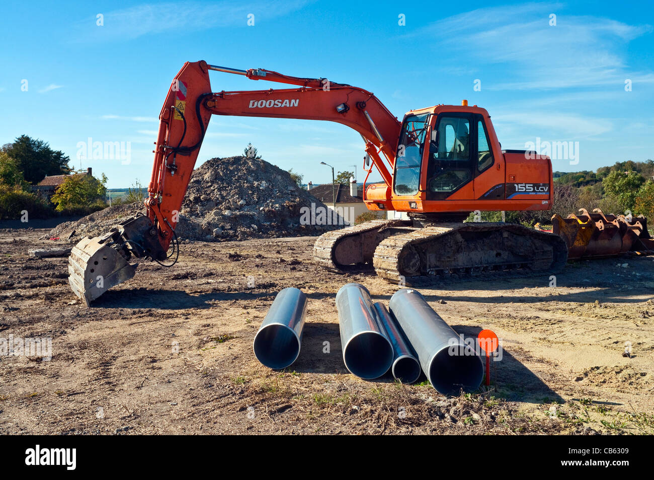 Mechanical digger on building site - France Stock Photo - Alamy
