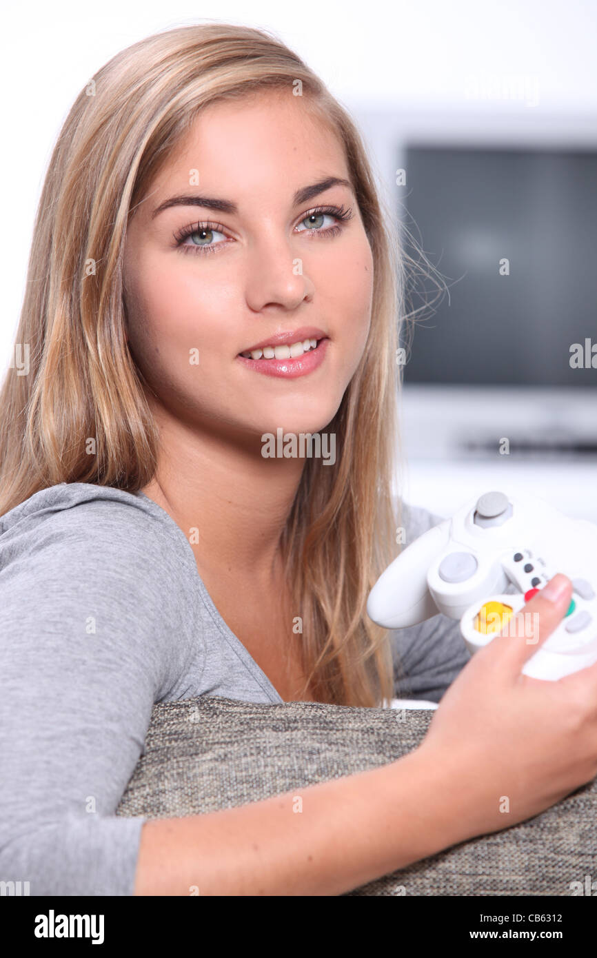 Teenage girl playing computer games Stock Photo - Alamy