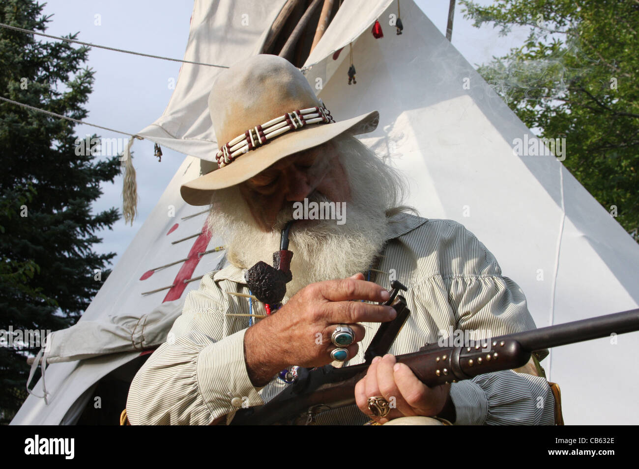 A historic hunter working on his rifle sights Stock Photo - Alamy