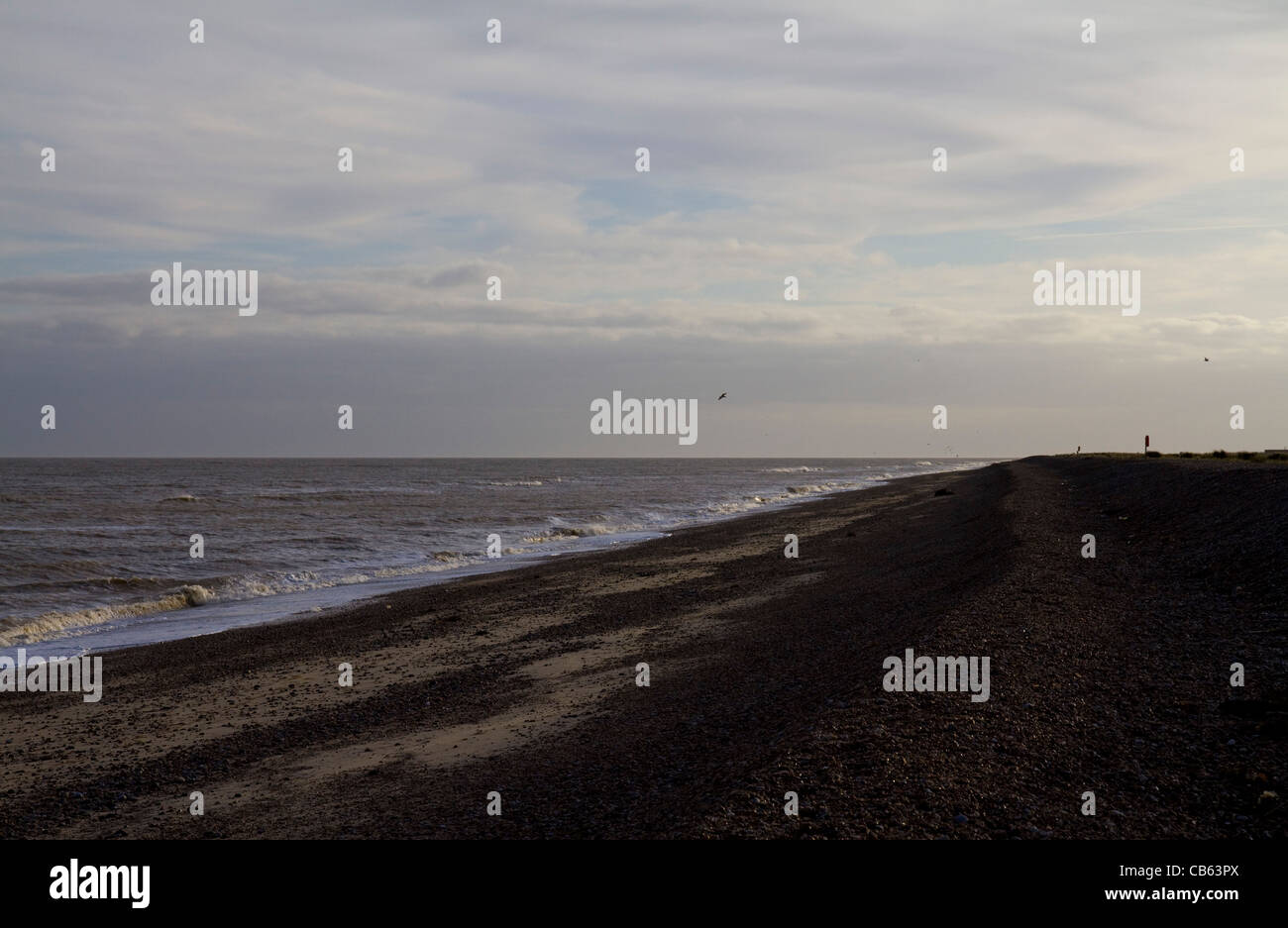 A view across the expanse of shingle and sand at Kessingland Beach ...
