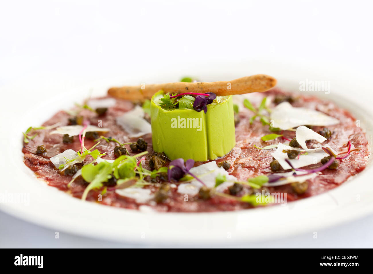 CARPACCIO DI CARNE, MOUSSE DI PISELLI E GRISSINI Stock Photo - Alamy