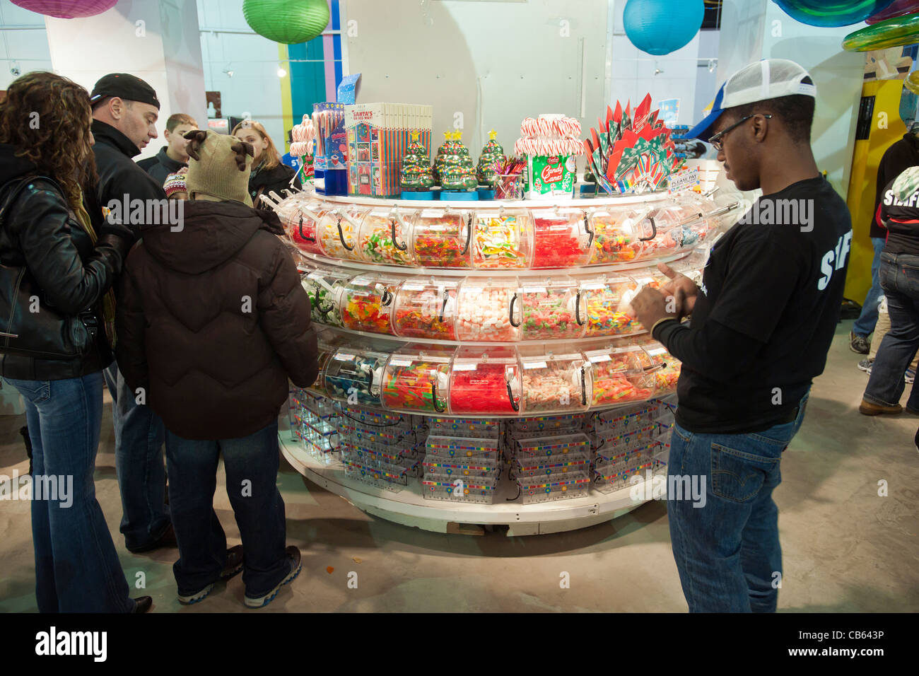 Customers shop at a Dylan's Candy Bar pop-up store in Midtown Manhattan ...