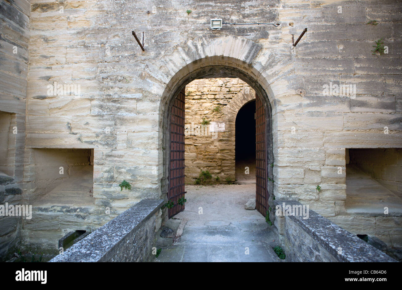 A gated archway in an old building in Saumane, France Stock Photo - Alamy