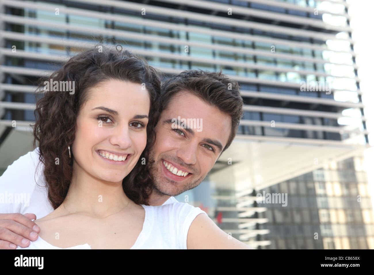 Couple in build up area Stock Photo - Alamy