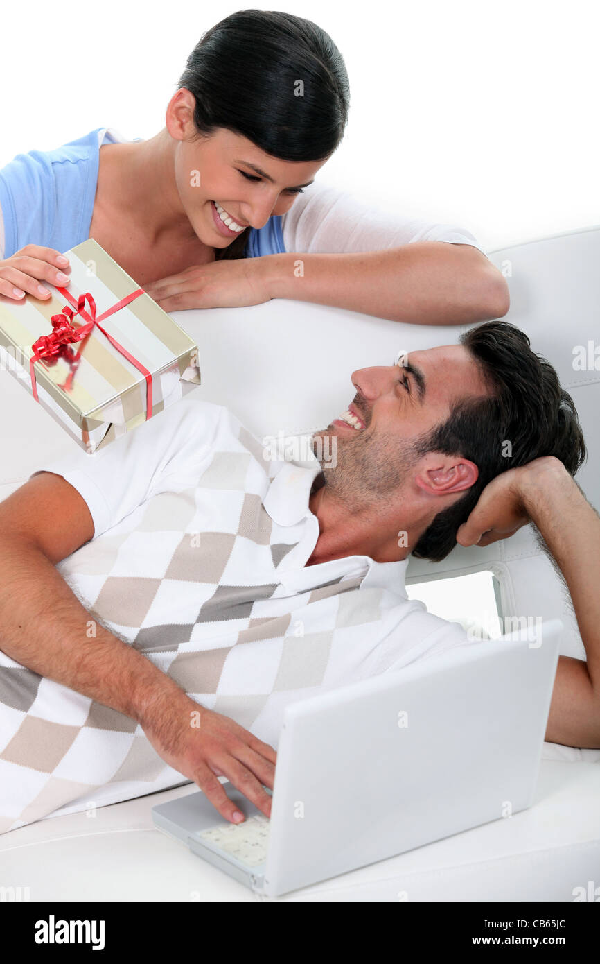 woman making a present to her boyfriend Stock Photo - Alamy