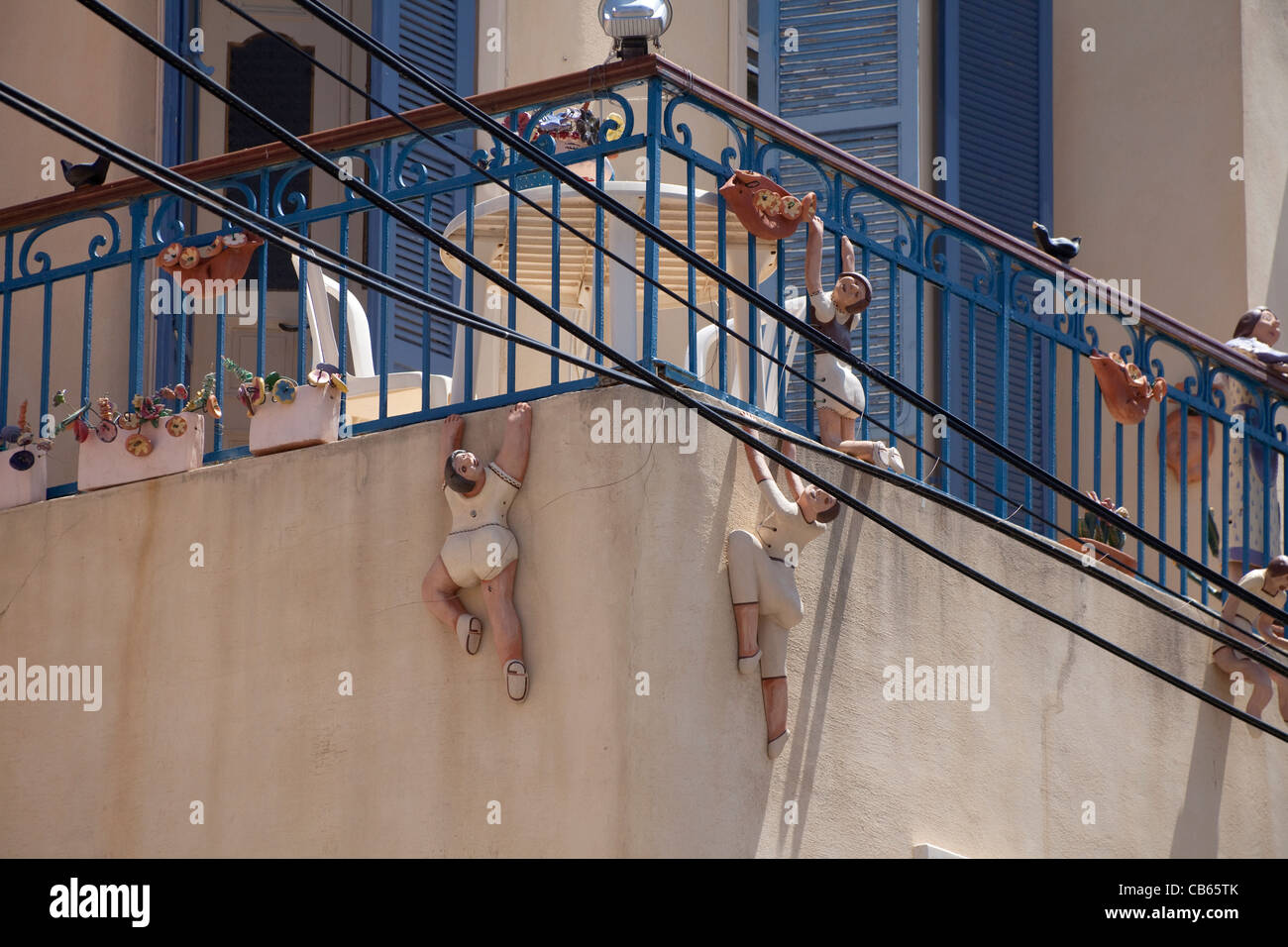 sculptures climbing the wall of the Rokach house in the Neve Zedek ...