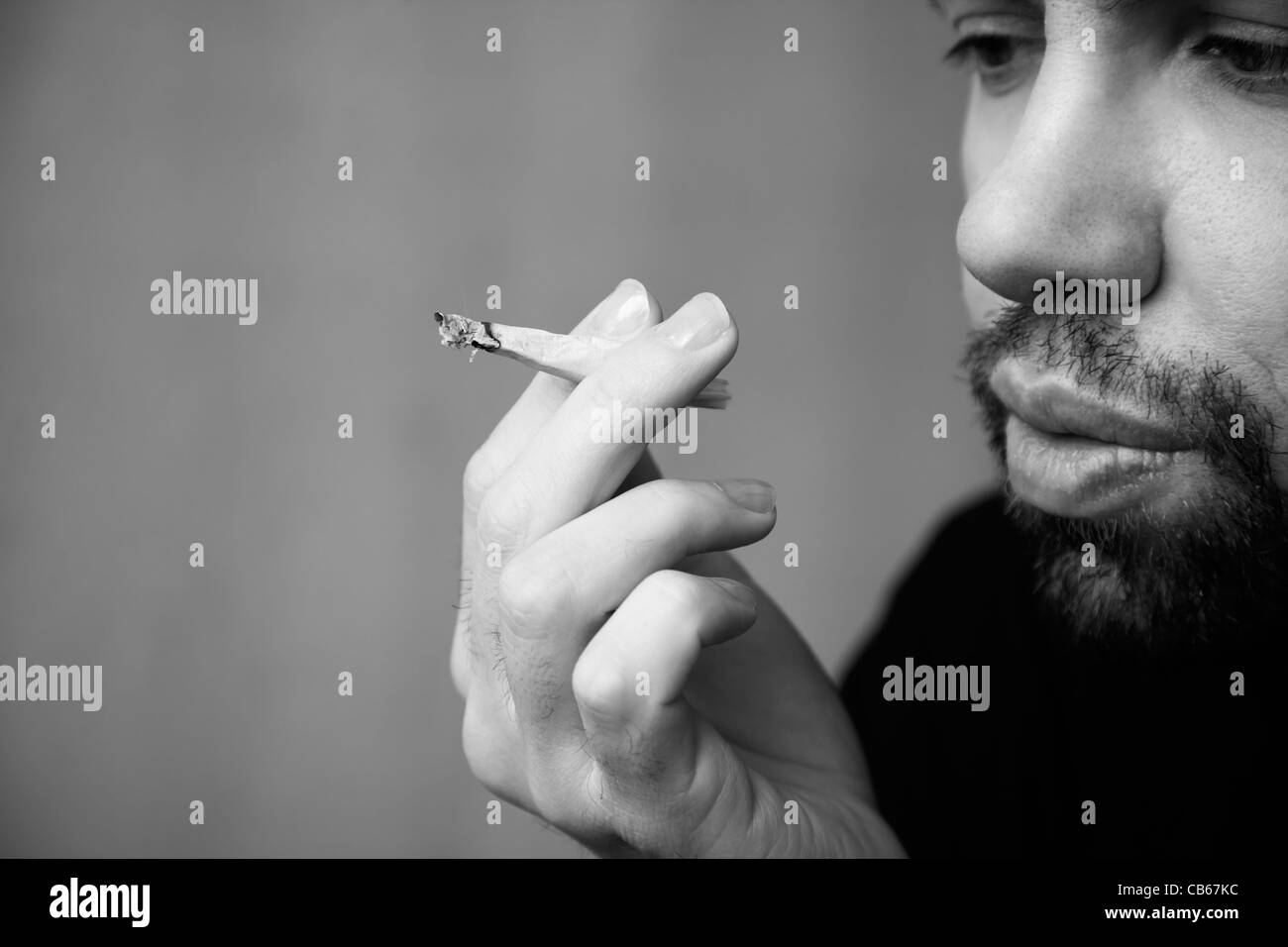 Marijuana joint cigarette Black and White Stock Photos & Images - Alamy