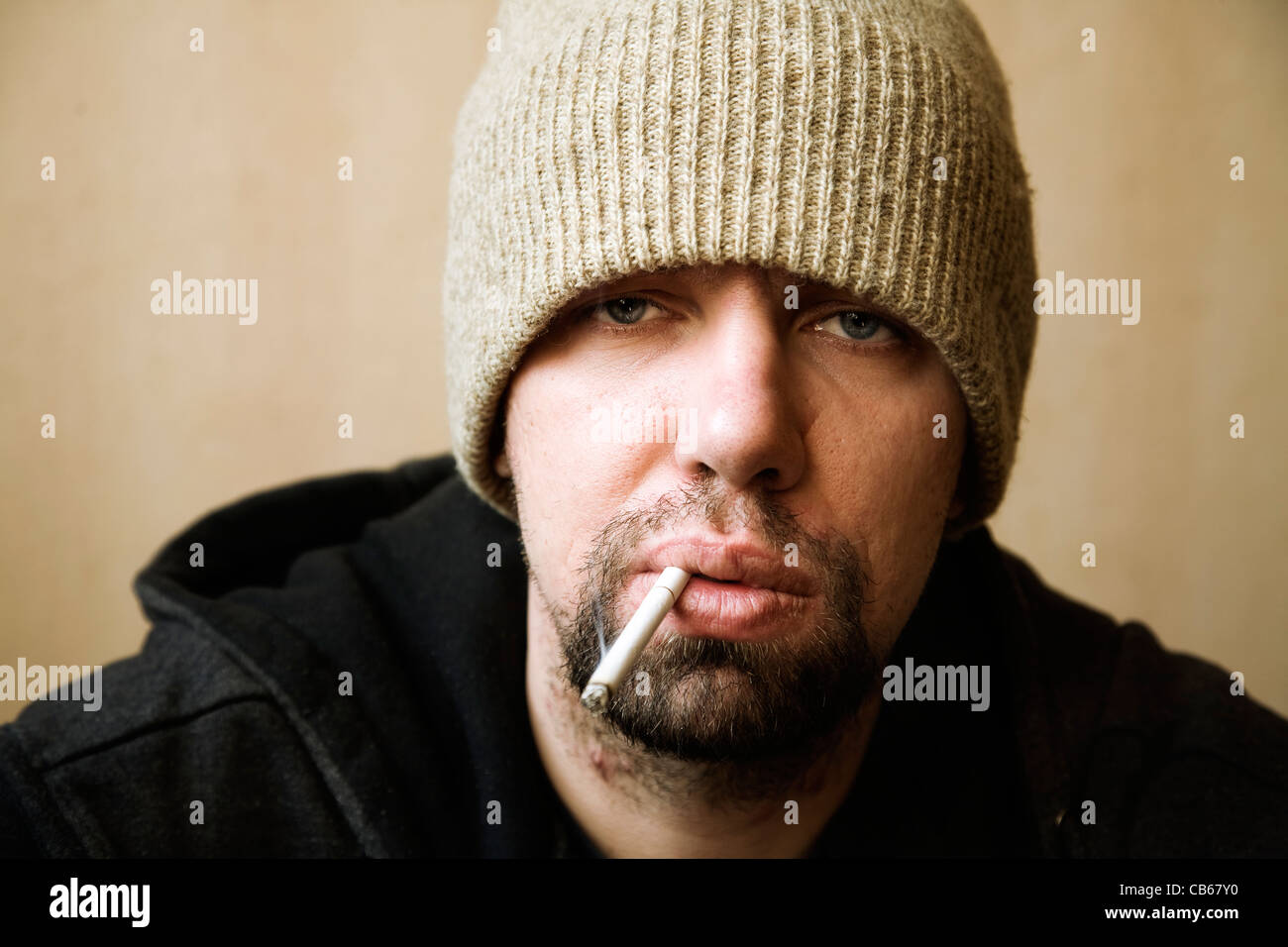 Hippie man smoking hi-res stock photography and images - Alamy