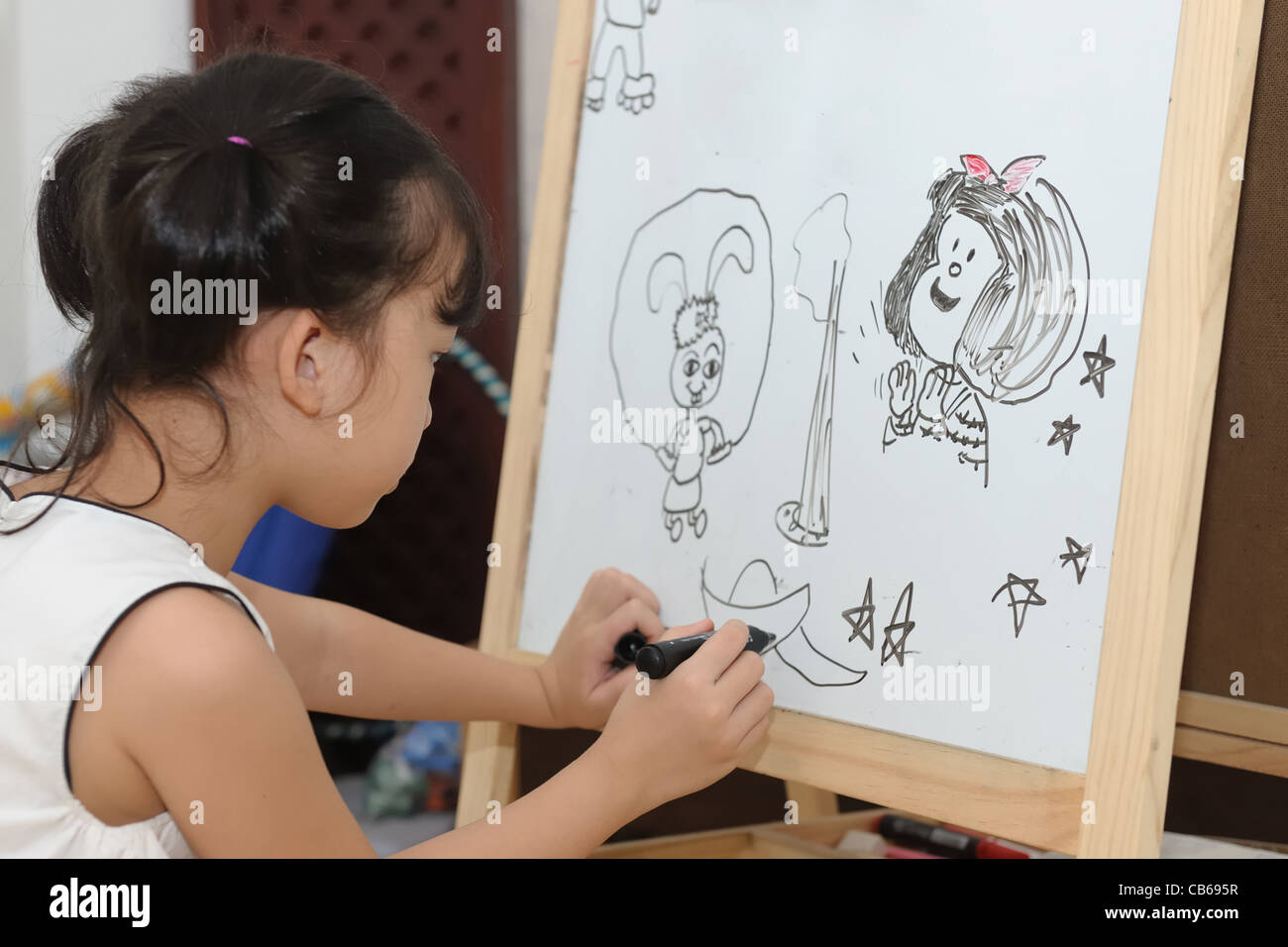 Chinese kid drawing hi-res stock photography and images - Alamy