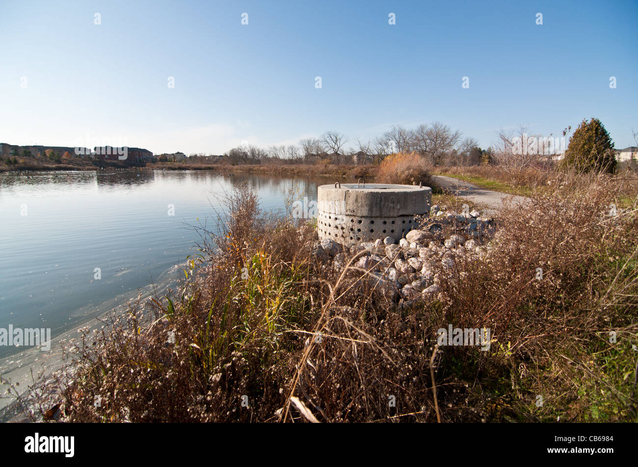 A perforated concrete pipe forms part of a stormwater management system ...