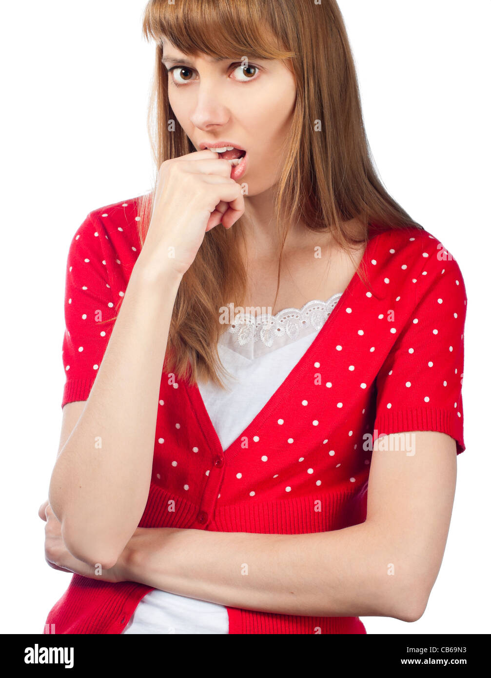 nervous beautiful young woman looking into the camera, hand at her ...