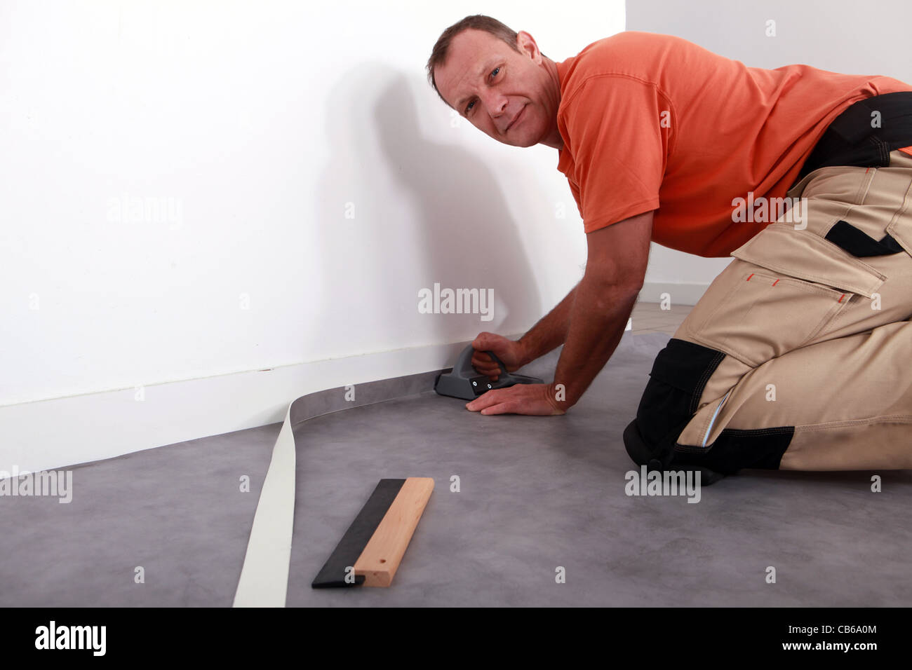 portrait of a man laying linoleum Stock Photo - Alamy