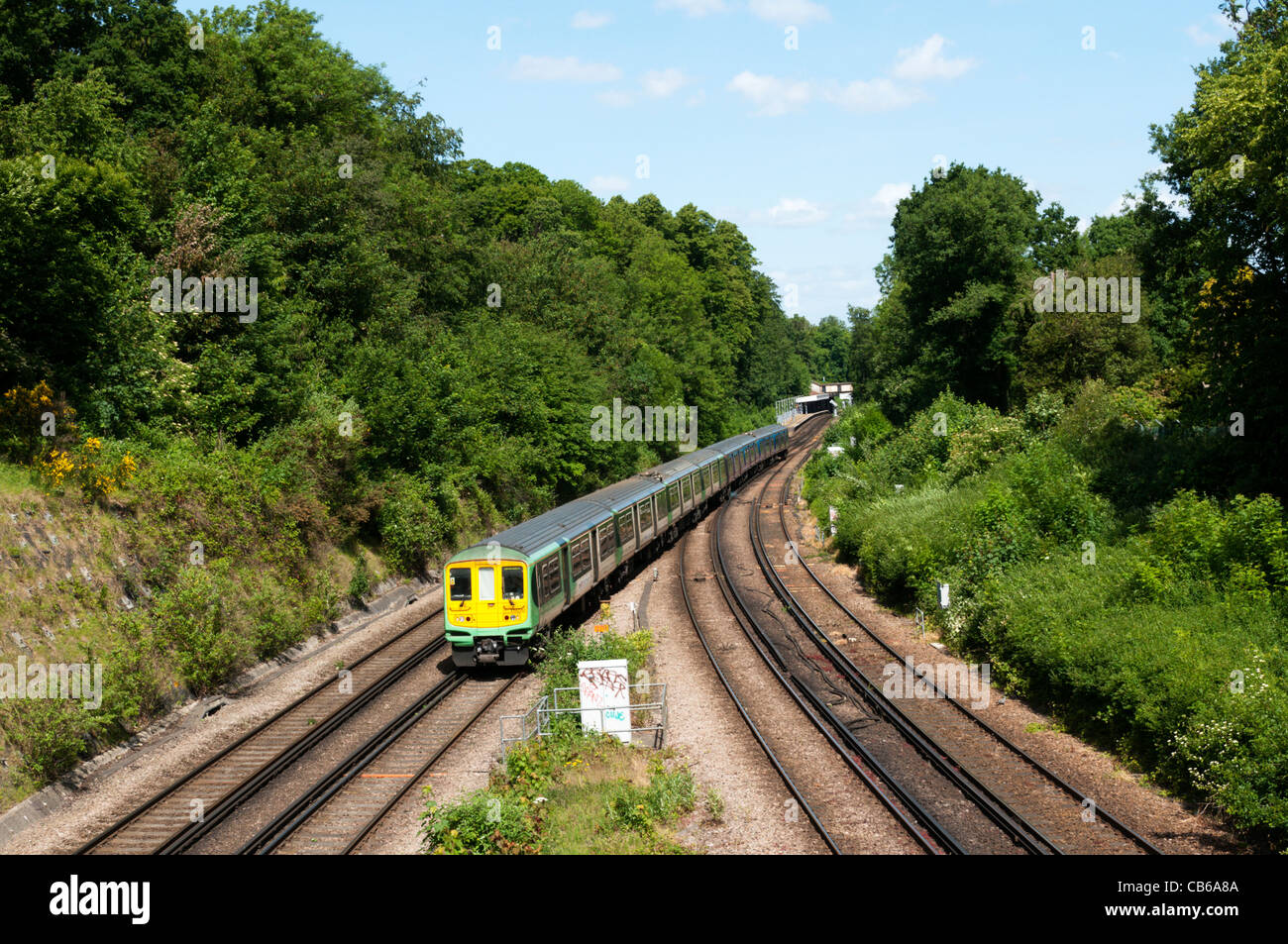 Commuter train outside Ravensbourne station on the line between London ...