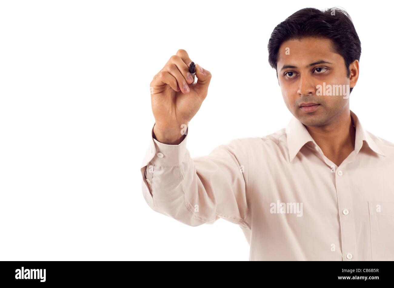 Indian business man writing on copy space, add your own text or drawing ...