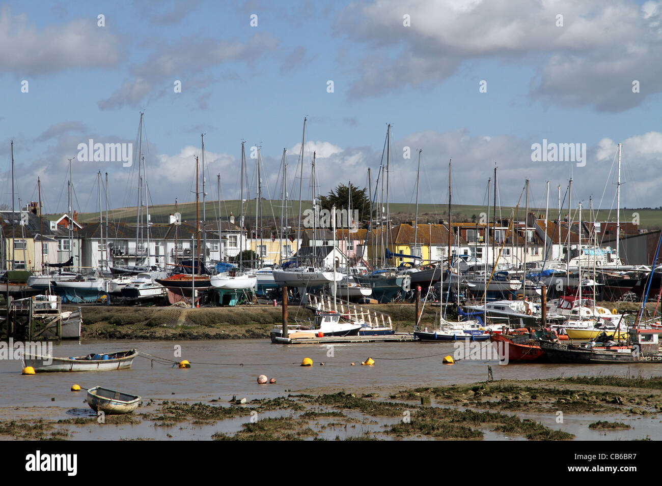 The boats at Shoreham marina with houses behind and the Sussex Downs in ...
