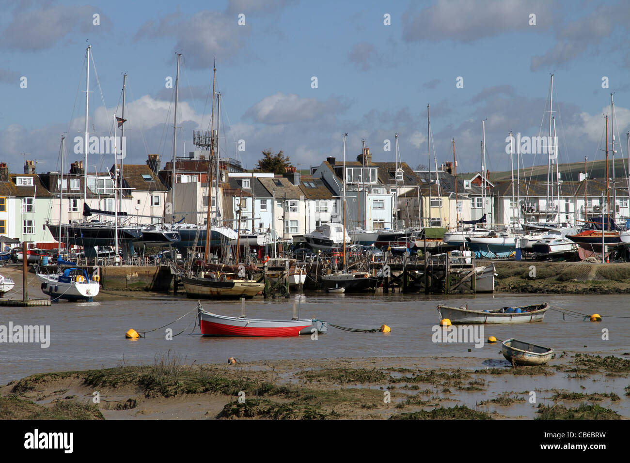 The boats at Shoreham marina with houses behind and the Sussex Downs in ...