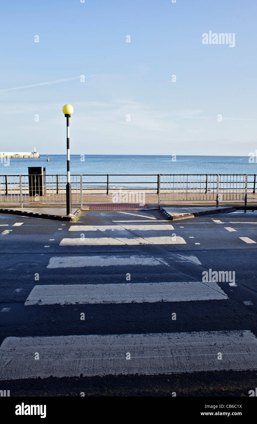 Zebra crossing and seaside promenade Stock Photo - Alamy