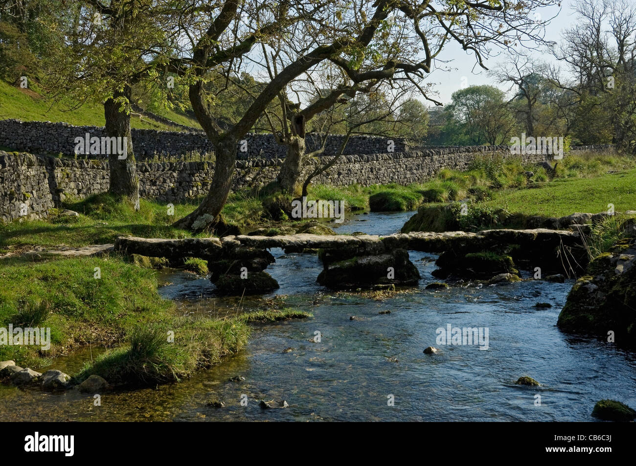 Clapper bridge across Malham Beck Malham Cove Malhamdale Yorkshire ...