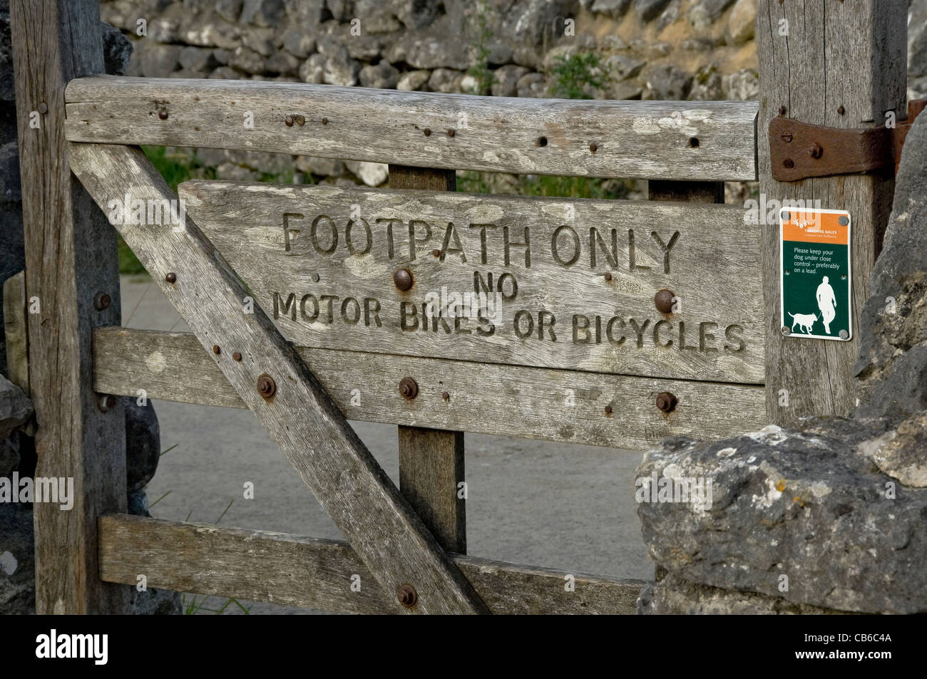 Close up of footpath path walk only sign on wooden gate Malham North ...