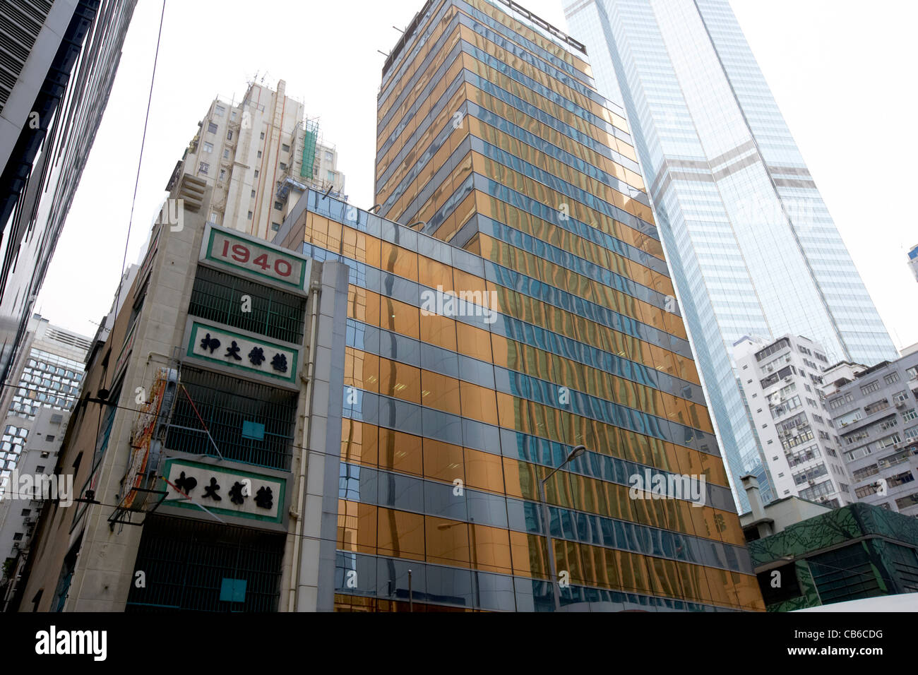 mixed new old high and low rise architecture including the tak wing ...