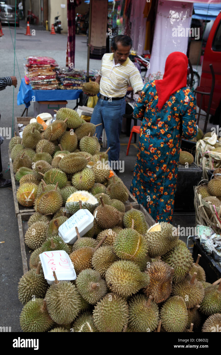 Durian for sale at street market in Chow Kit Stock Photo - Alamy