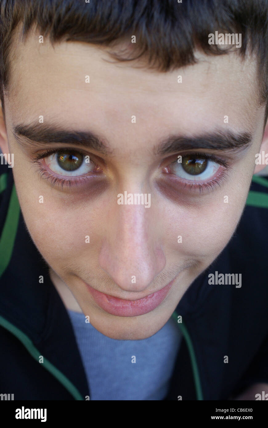 Things are looking up for a young teenager Stock Photo - Alamy