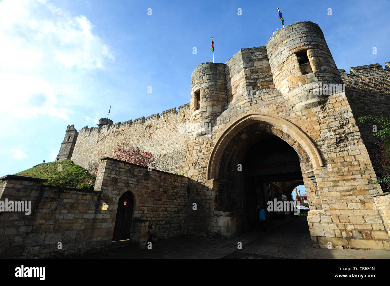 The eastern gate of Lincoln Castle with the observatory tower in the ...