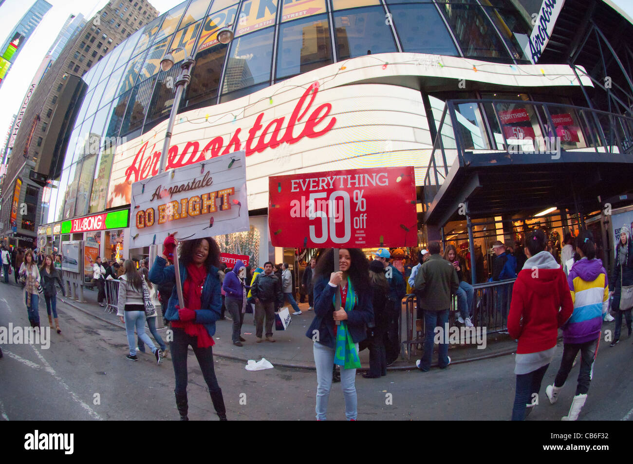 Employees drum up business outside the Aeropostale store in Times ...