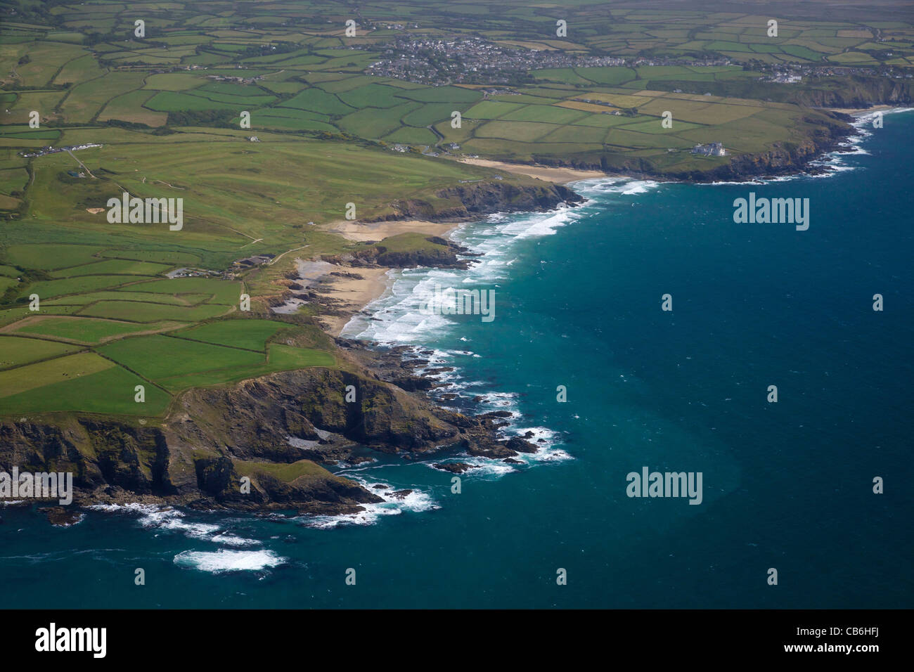 Aerial view of Poldhu Cove looking south to Mullion, Lizard Peninsula ...