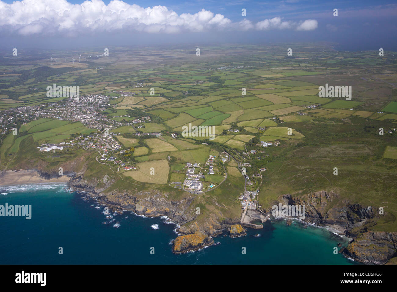Aerial view of Mullion Cove looking east to Goonhilly, Lizard Peninsula ...