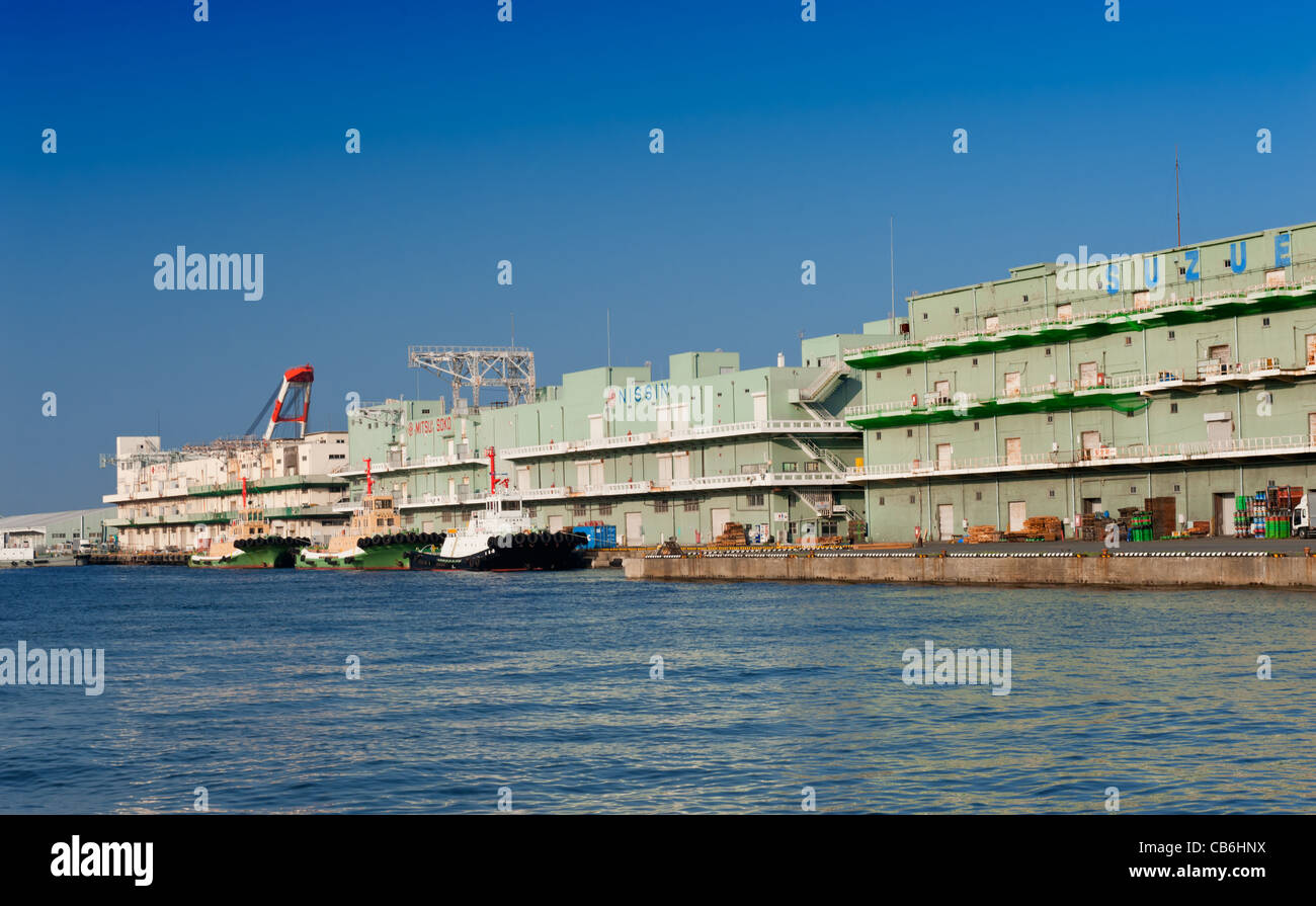 Great pier with cargo containers in Yokohama harbor, Japan Stock Photo ...
