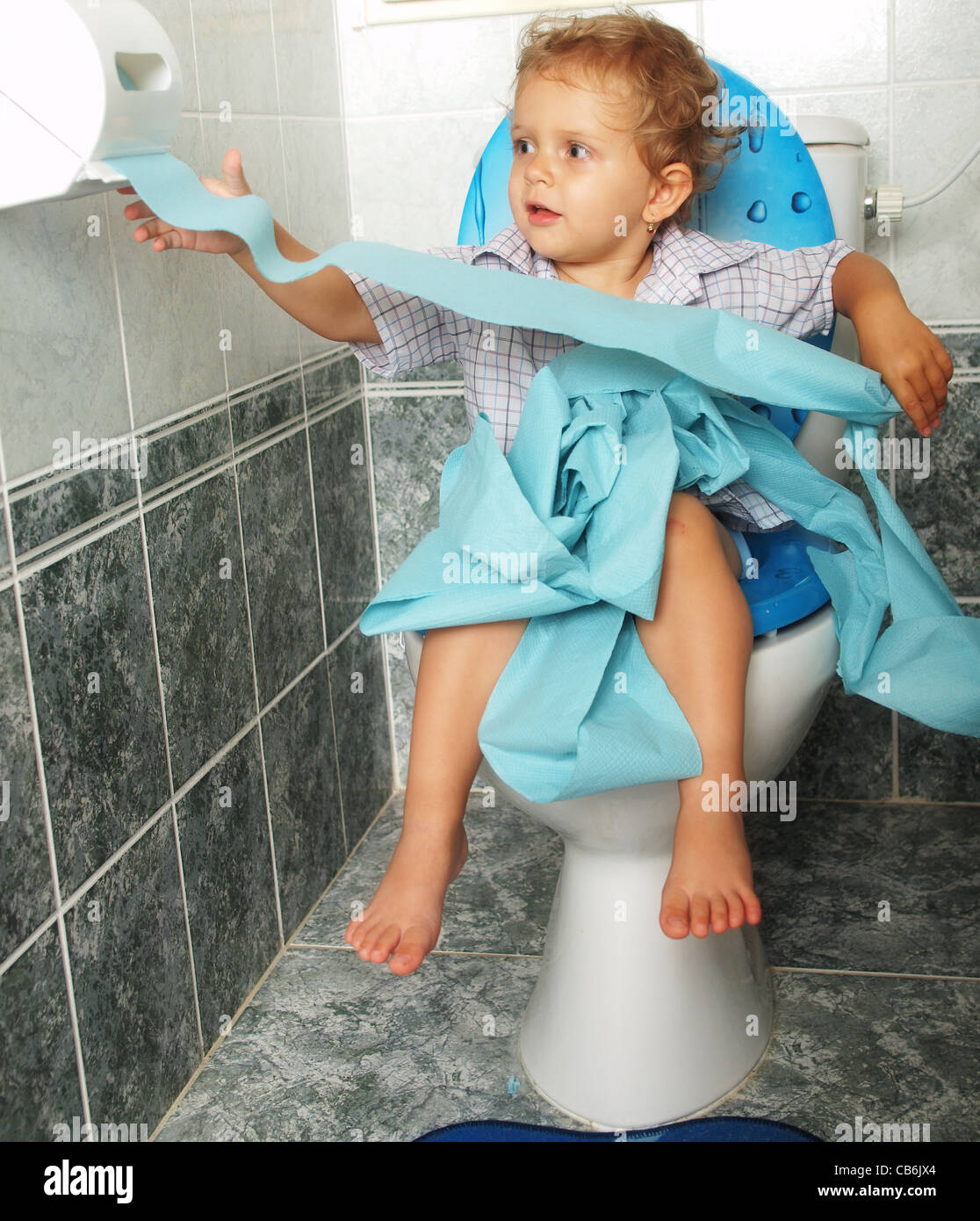Baby and lavatory Stock Photo - Alamy