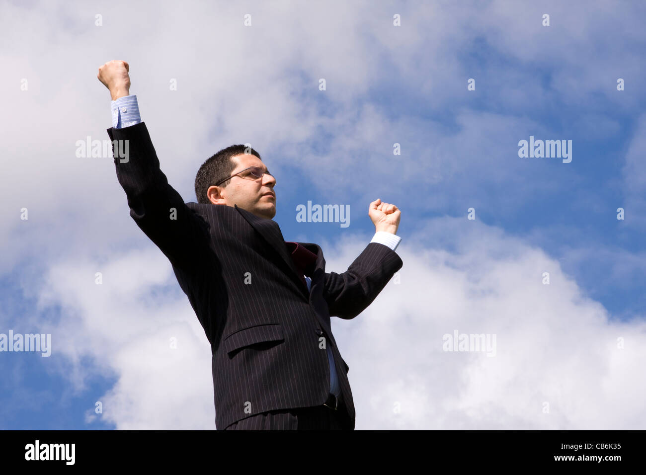 a successful businessman showing his moment of victory Stock Photo - Alamy