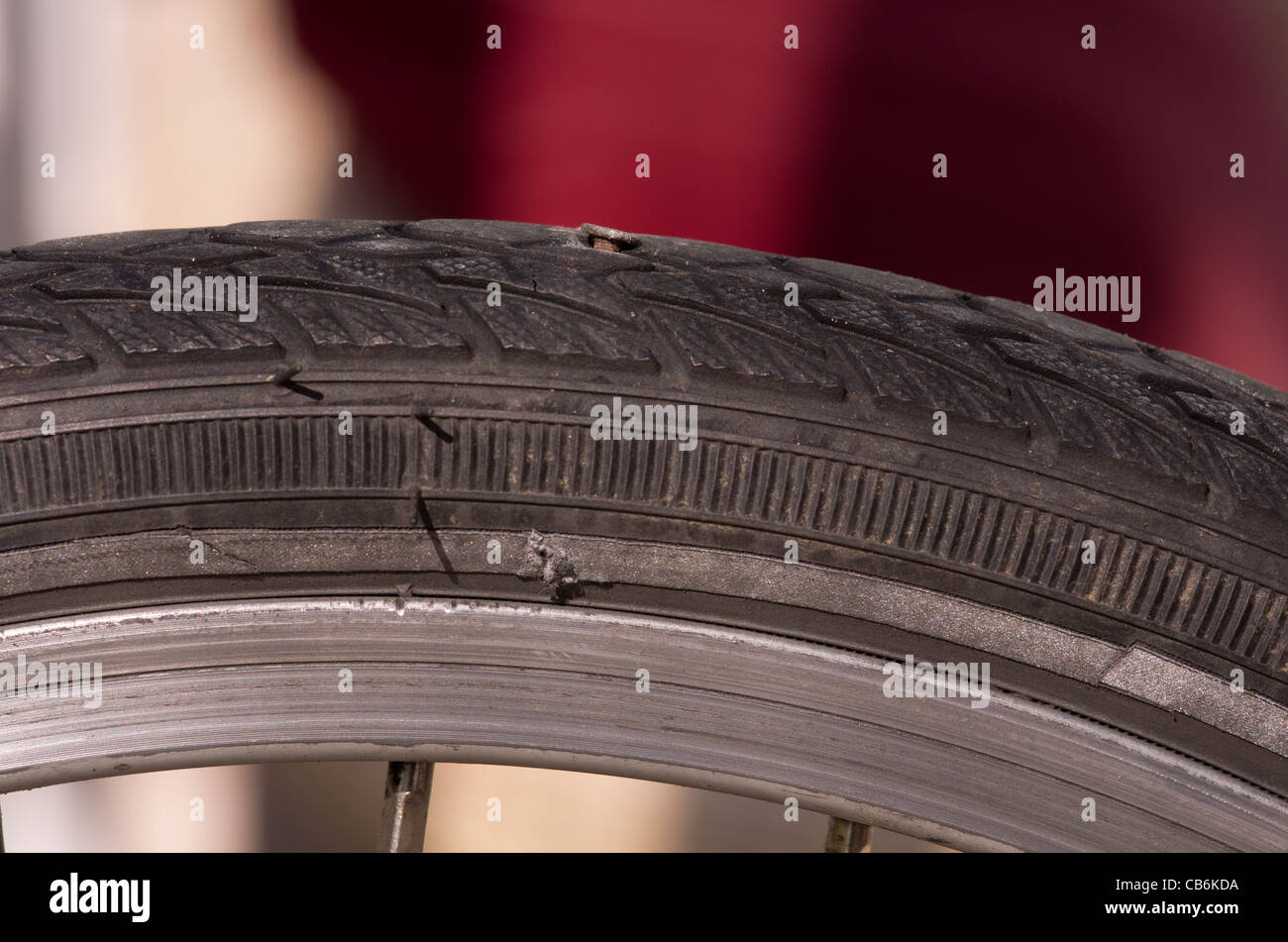 nail deeply penetrates bicycle wheel causing puncture Stock Photo - Alamy