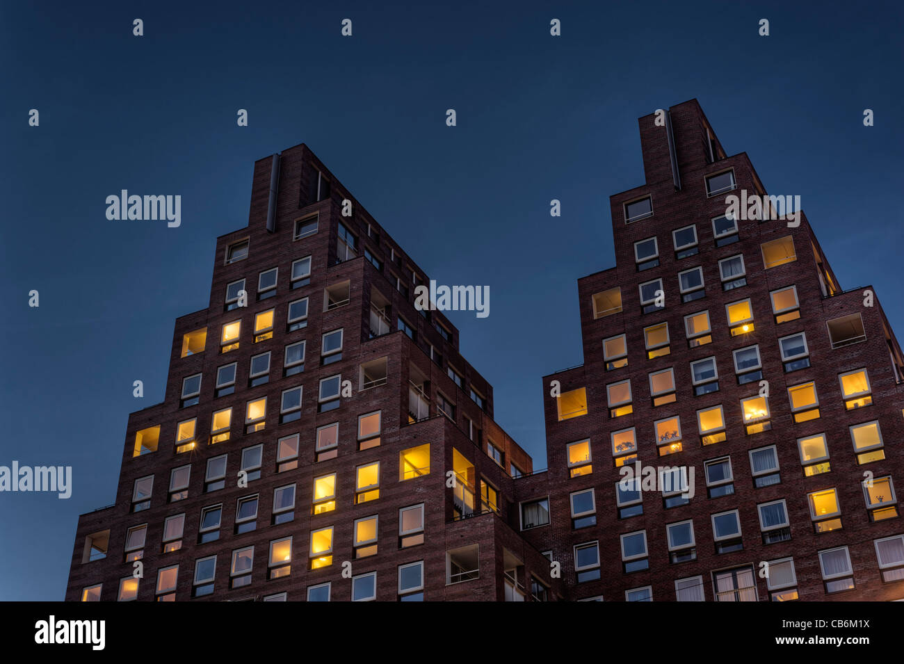 Modern apartment buildings at dusk, Amsterdam, Netherlands Stock Photo ...