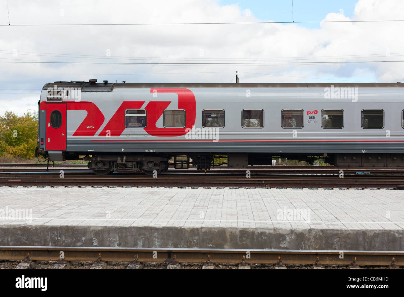 Russian train carriage. Logo of Russian Railways (RZhD). Third-class ...