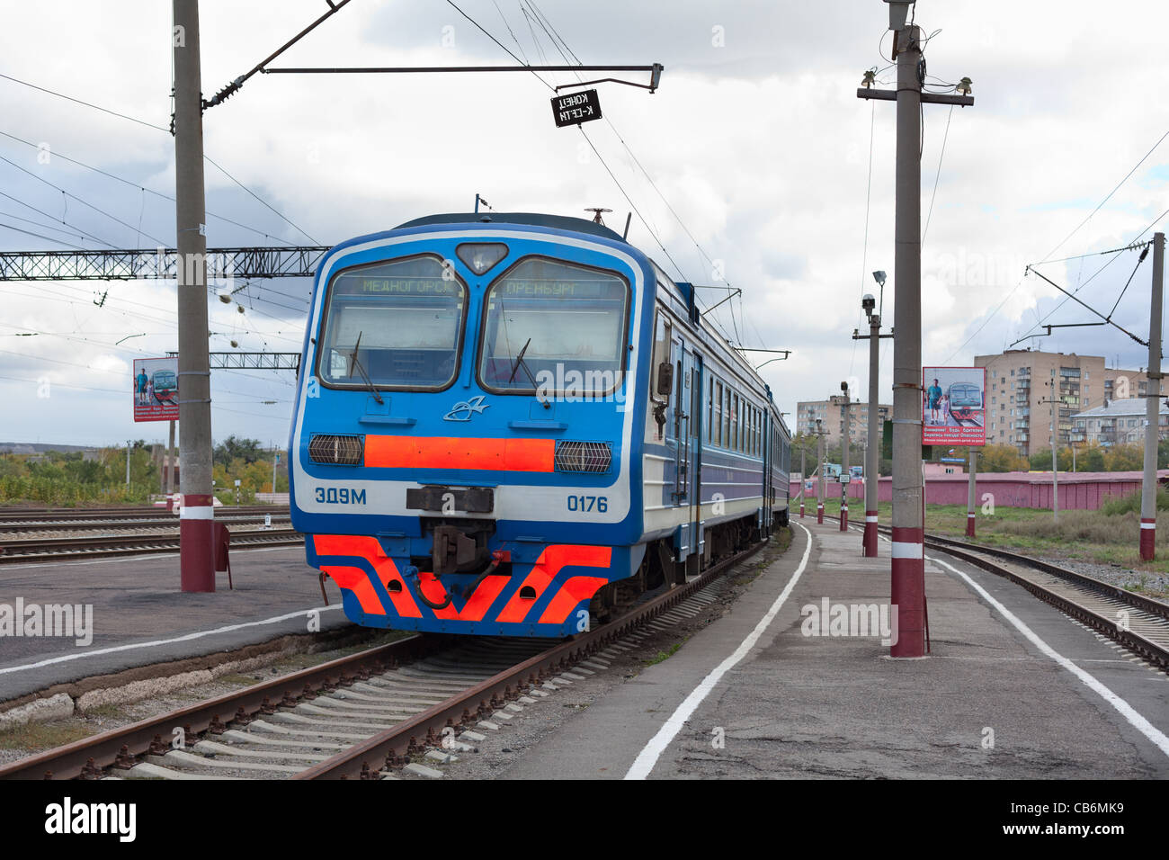 Russian suburban electric train on rails in the city of Magnitogorsk ...