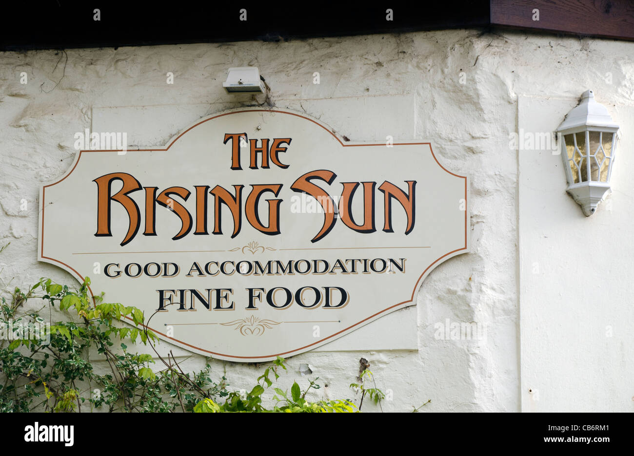 Pub wall sign: The Rising Sun West Bagborough Somerset UK Stock Photo ...