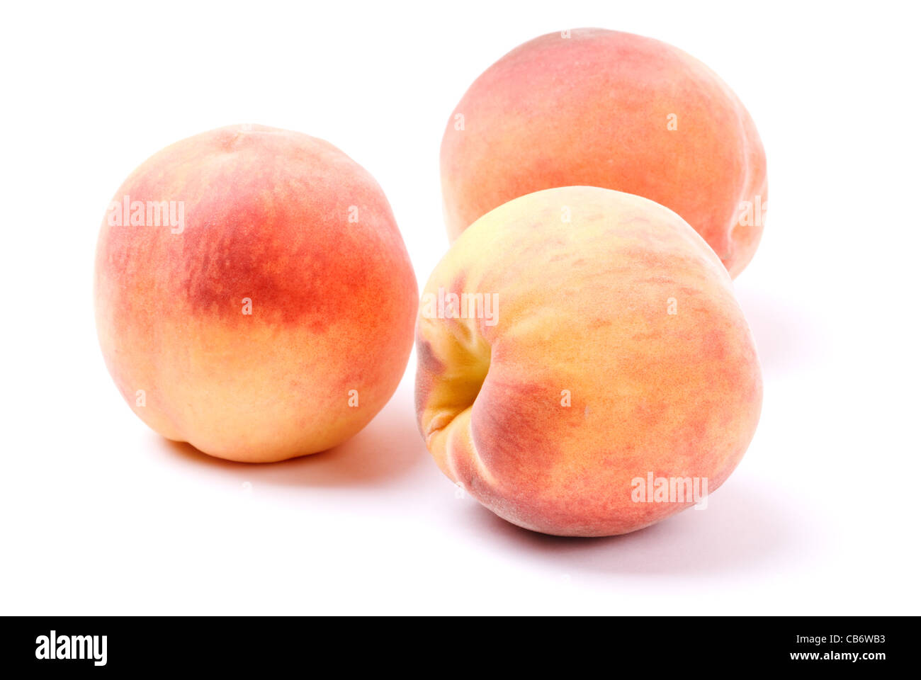peach isolated on white background, focus point on center Stock Photo ...